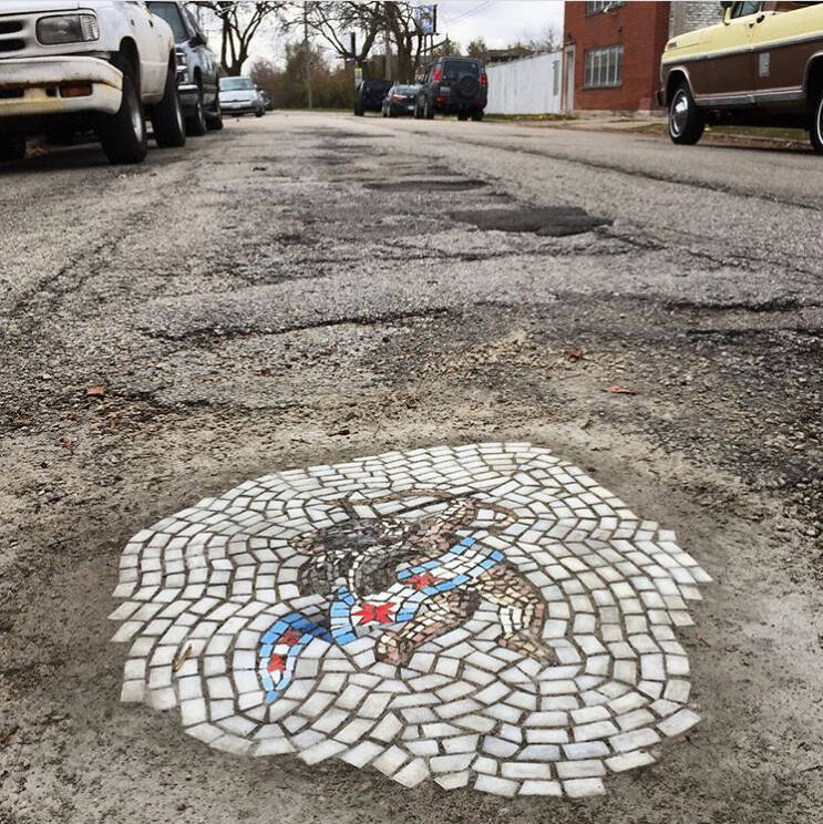 Chicago Guerrilla Artist Jim Bachor Fills Potholes With Whimsical Mosaics