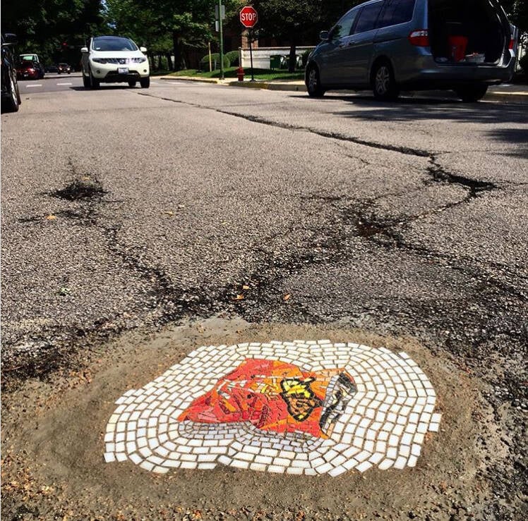 Chicago Guerrilla Artist Jim Bachor Fills Potholes With Whimsical Mosaics