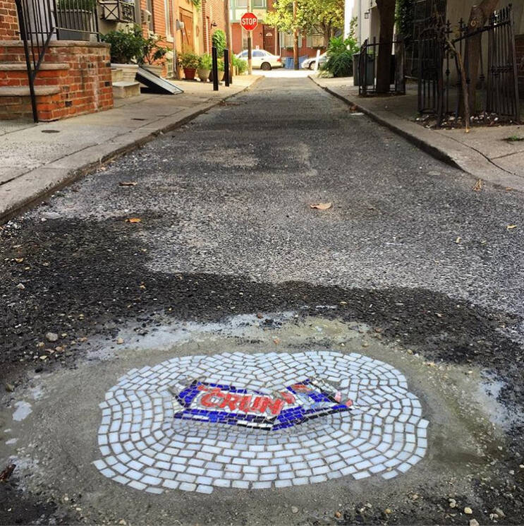 Chicago Guerrilla Artist Jim Bachor Fills Potholes With Whimsical Mosaics