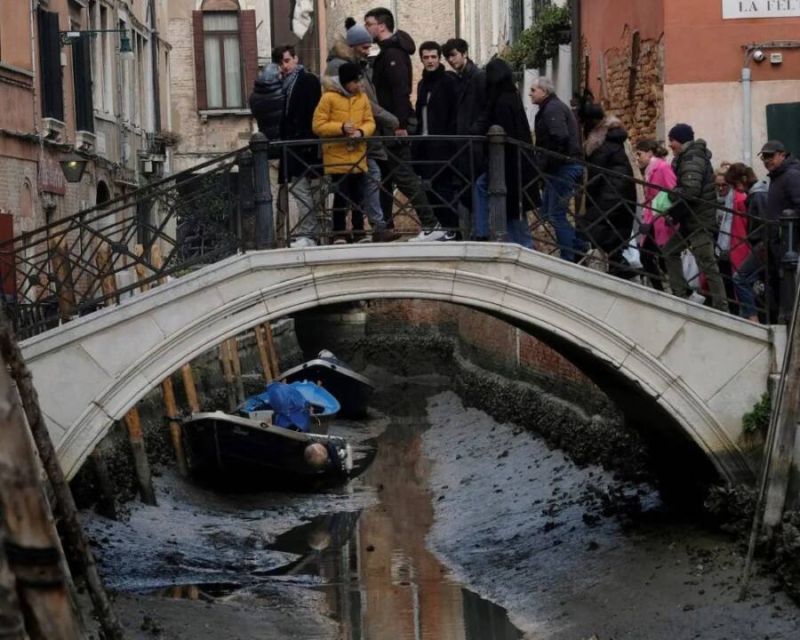Drought And Low Tides Cause Venetian Canals To Run Dry